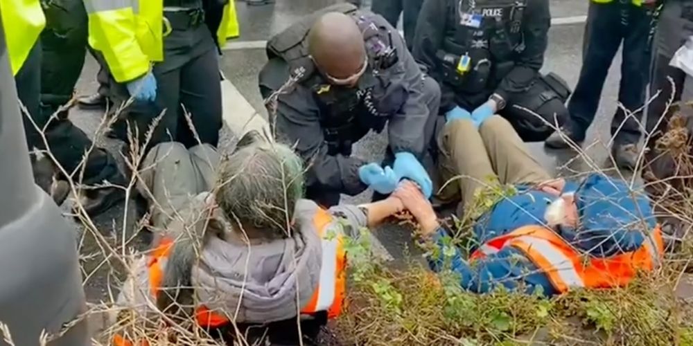 WATCH: Protesters super glue their hands together to demand climate ...