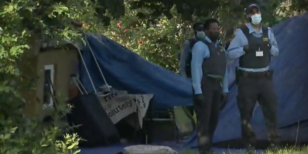 Officials clear out longstanding homeless encampment in Toronto’s ...