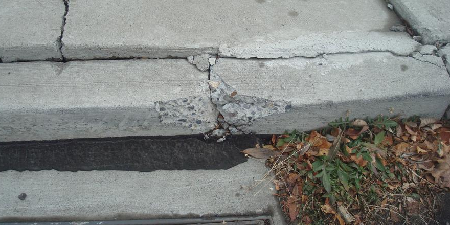 Curb damaged by city truck 26 years ago to be repaired by 2037 | The ...